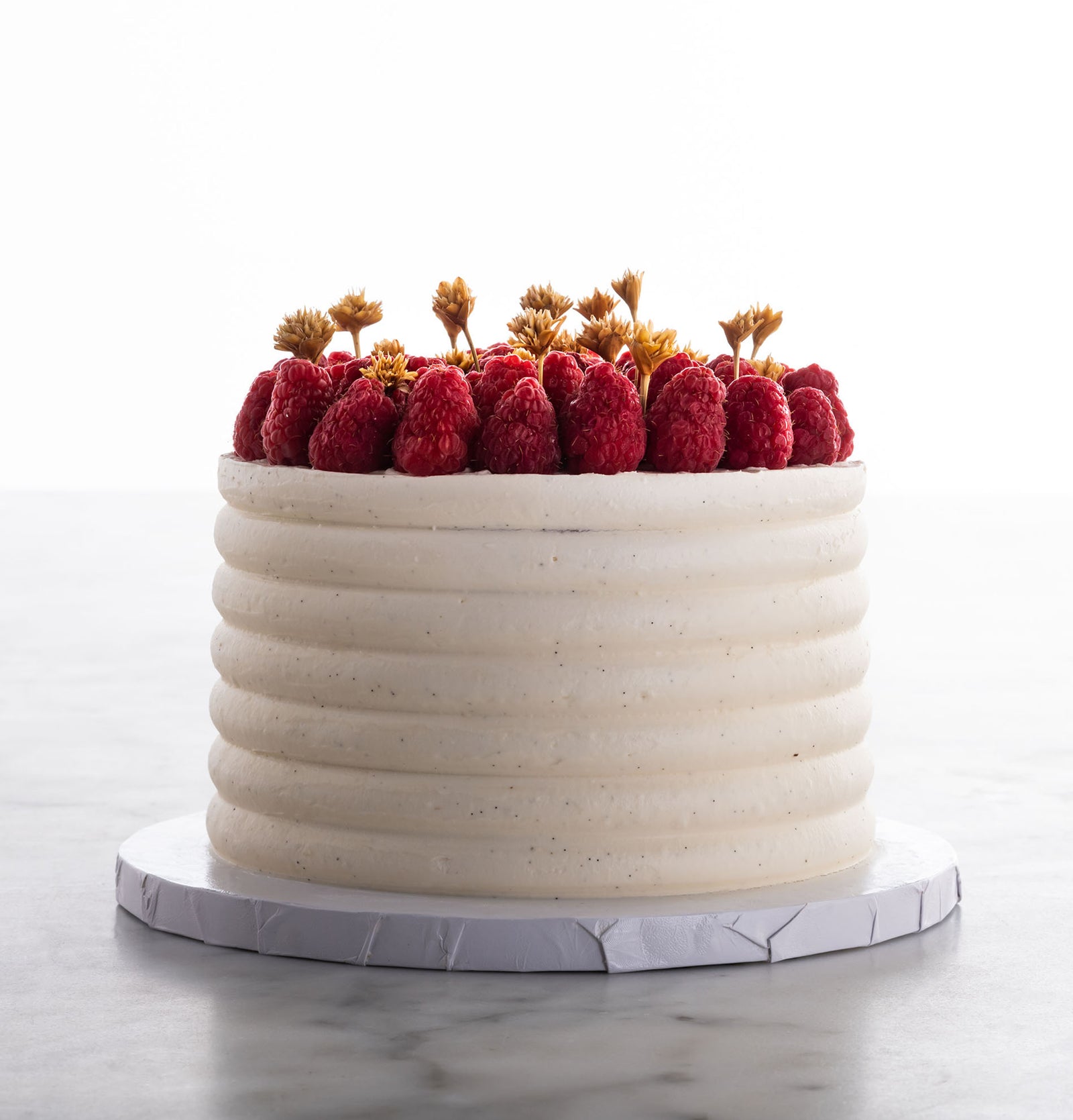 white raspberry cake cart